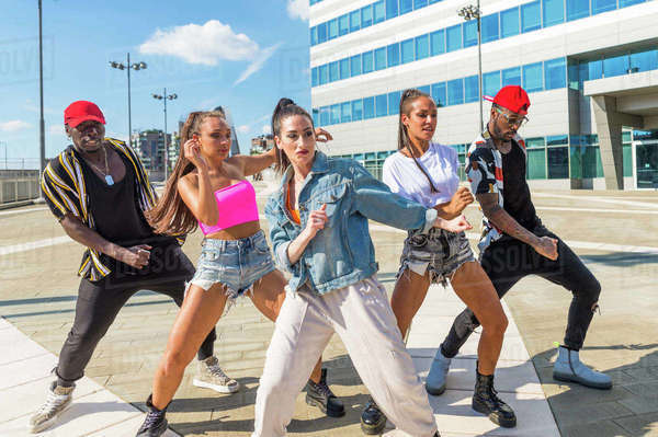 Hip hop crew dancing - Multiracial group of people having fun outdoors ...