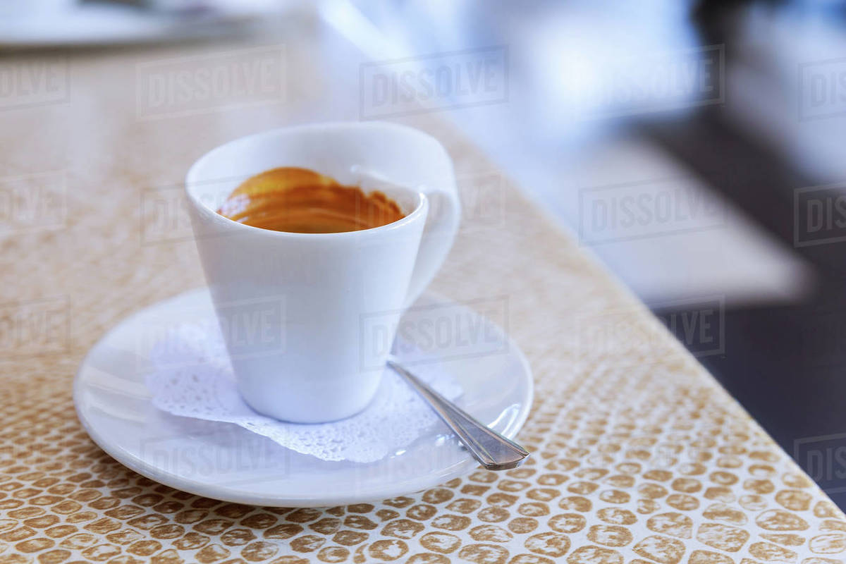 Coffee cup on the table at the coffee shop, color tone. - Royalty-free ...