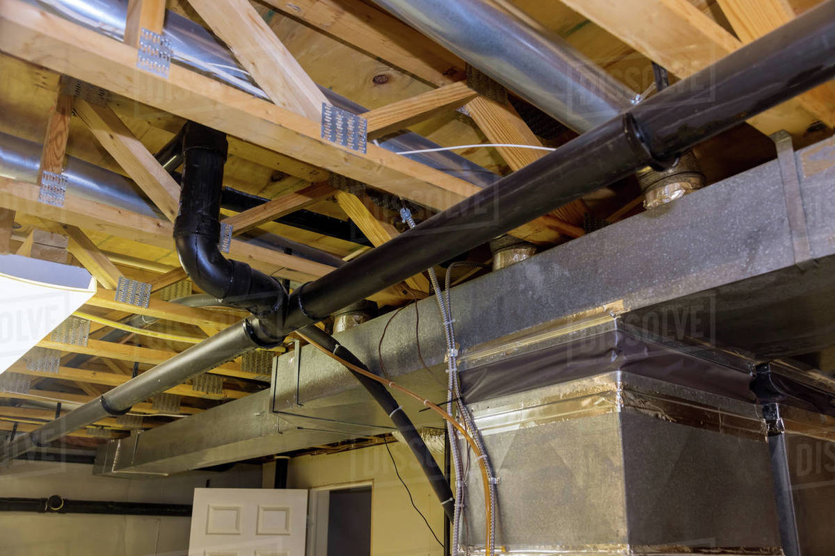 Framed home installation of air conditioner and heating ductwork in ...