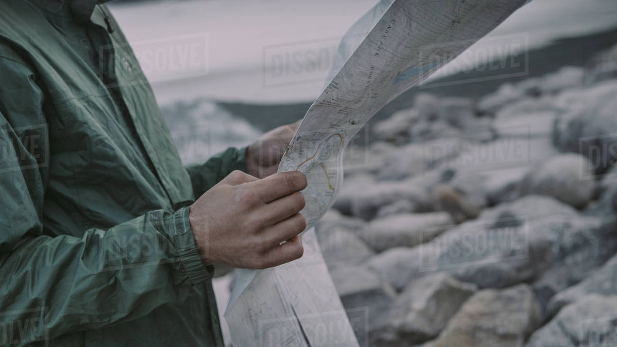 Map in hands - Royalty-free Stock Photo | Dissolve