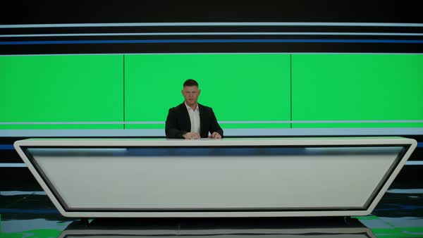 GREEN SCREEN CHROMA KEY Caucasian male anchorman reporting on a story ...