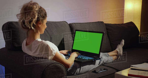Chroma Key Green Screen Laptop Computer. Woman working typing home ...