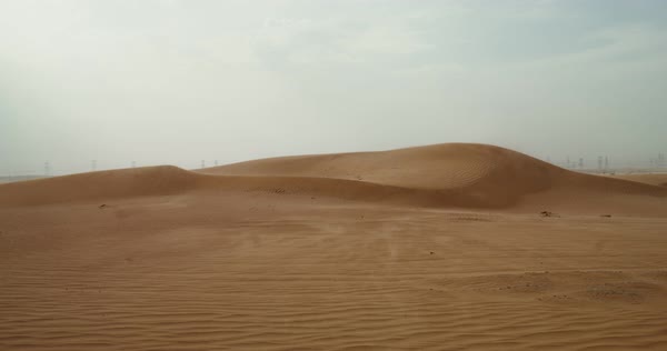 The wind inflates the sands of the desert, forming a beautiful sandy ...