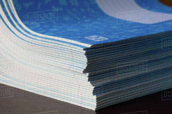 Stack of Notebooks. Back to school. A pack of blue school notebooks on ...