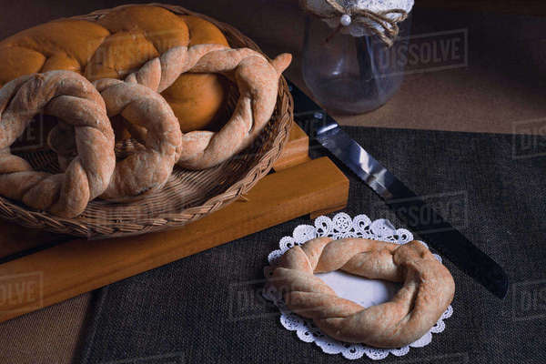 bread with thread on the table ready to cut with the knife - Stock ...