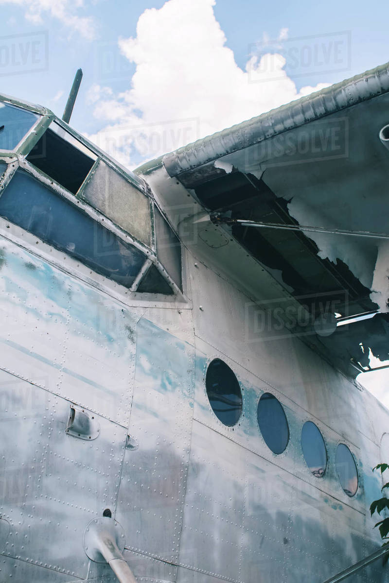 Close-up of a crashed airplane wing. The metal frame and internal parts ...