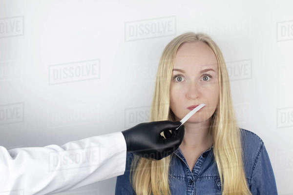 The girl complains to the doctor about the loss of smell. The doctor ...