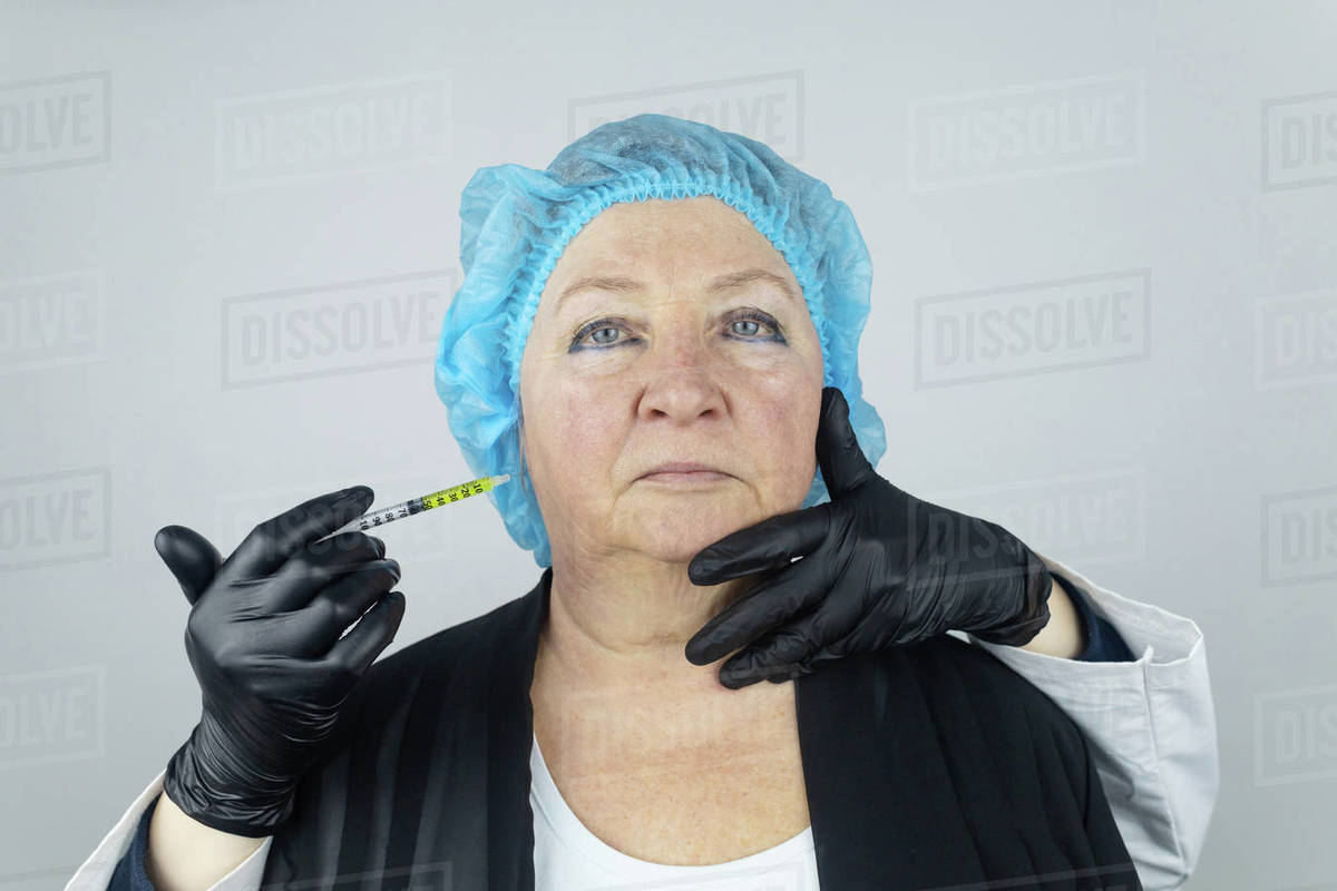 Botulinum toxin injection. Senior woman at the appointment with a ...