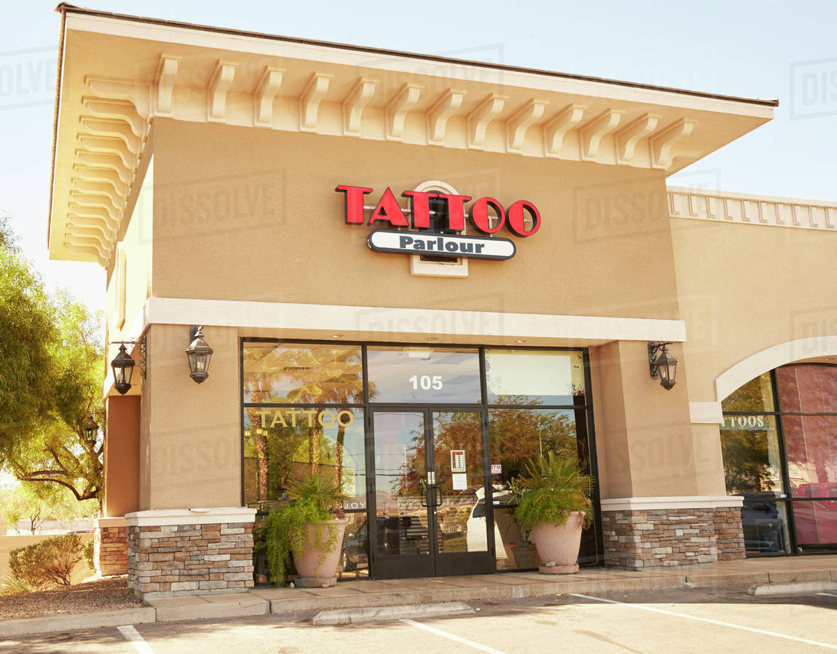 Exterior view of tattoo parlor - Royalty-free Stock Photo | Dissolve