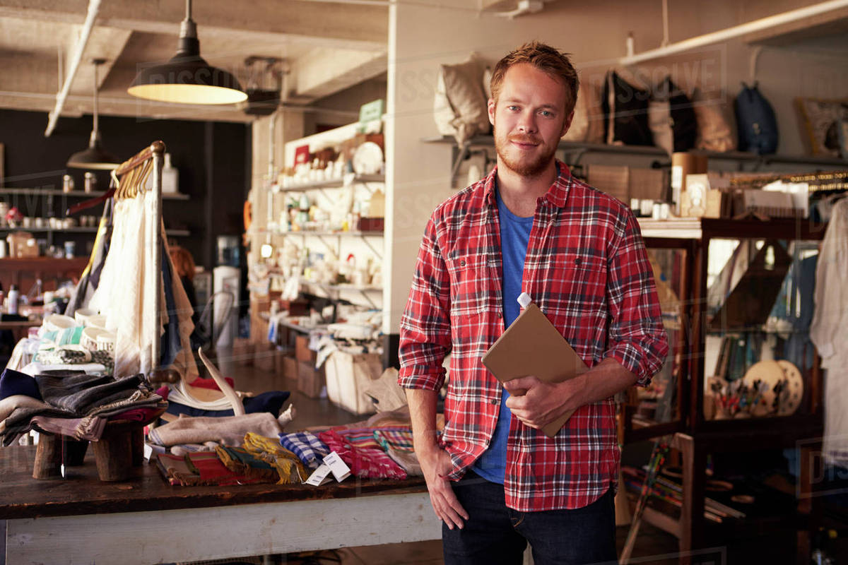 Portrait of male owner of gift store with digital tablet - Royalty-free ...