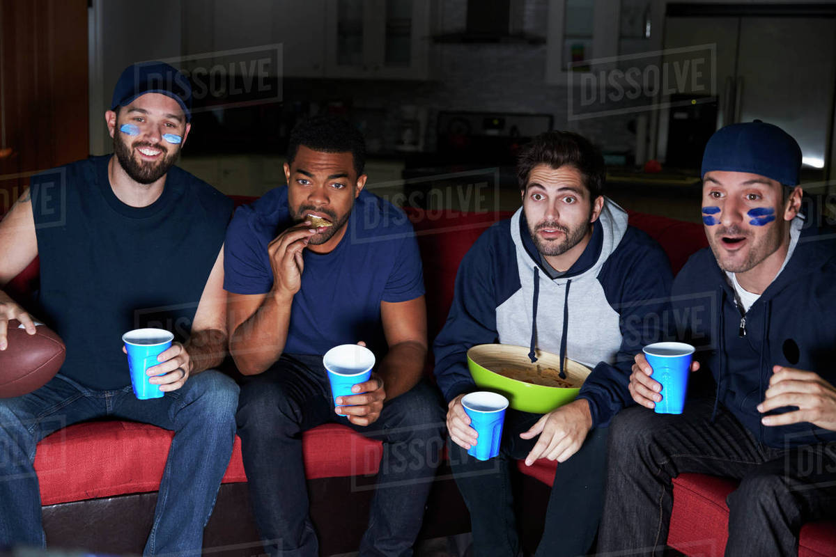 Group Of Male Sports Fans Watching Game On Television - Royalty-free ...