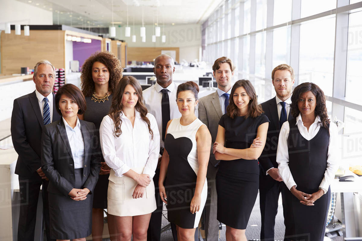 Group portrait of a team of serious office coworkers - Royalty-free ...