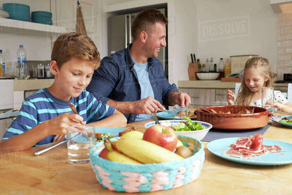 Children Helping To Lay Table For Family Meal - Royalty-free Stock ...