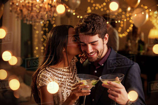 Romantic couple enjoying cocktail party together - Royalty-free Stock ...