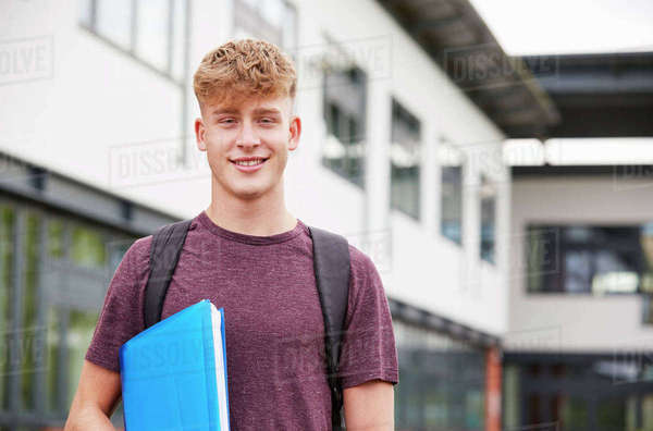 Portrait Of Male Student Standing Outside College Building - Stock ...