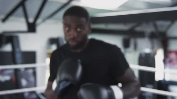 Point of view shot of male boxer sparring in gym boxing ring - shot in ...