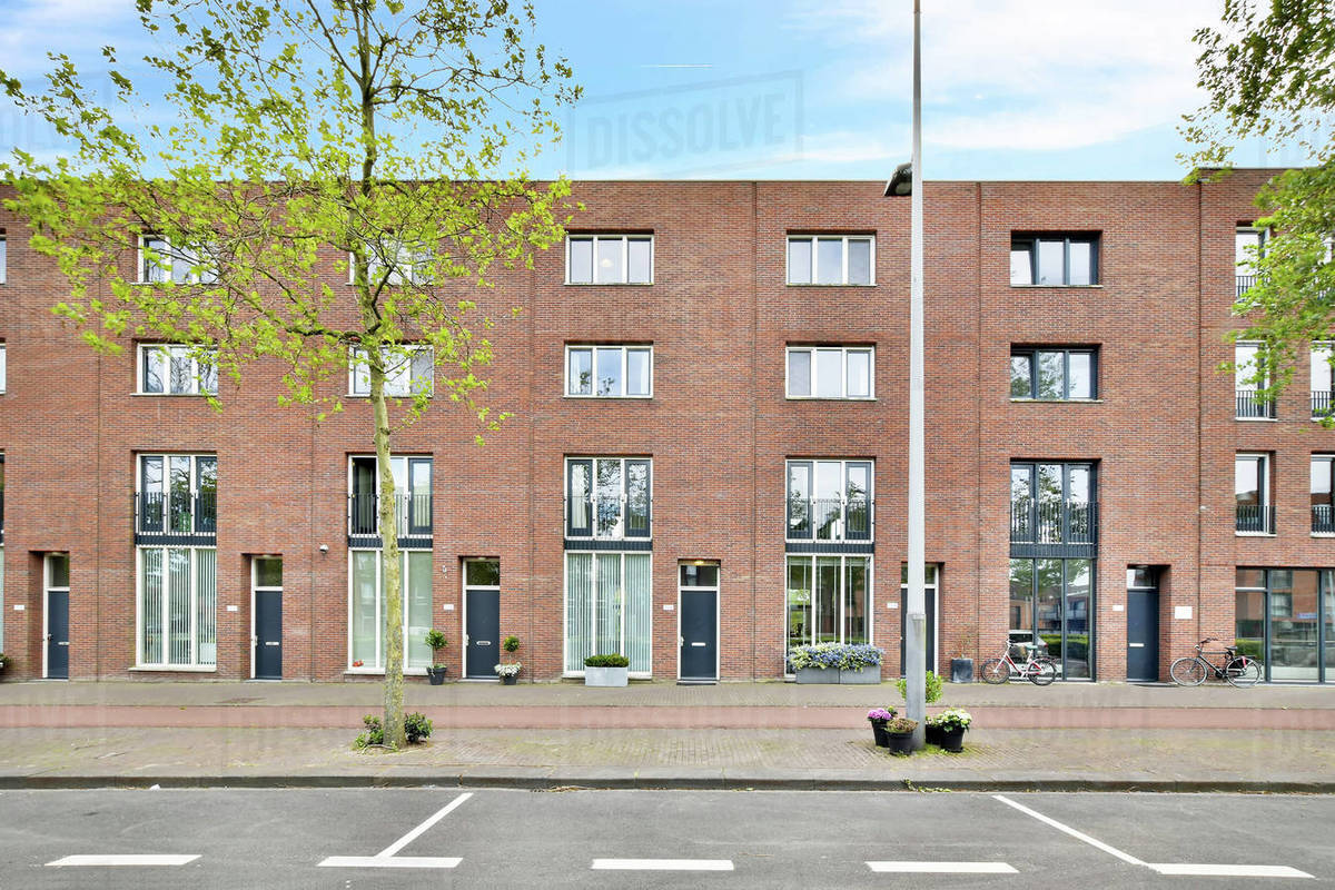 Nice view of big luxury residential building - Stock Photo - Dissolve