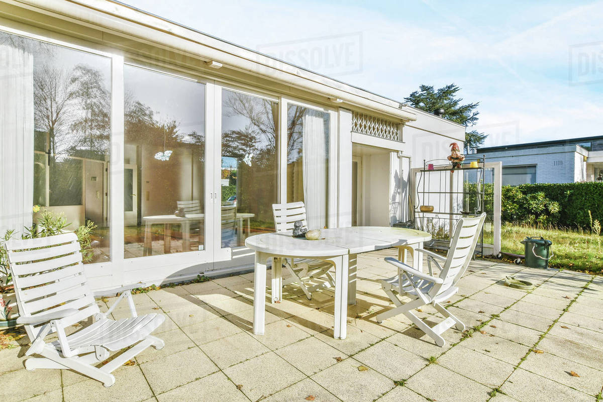 View of cozy small house in countryside area - Stock Photo - Dissolve