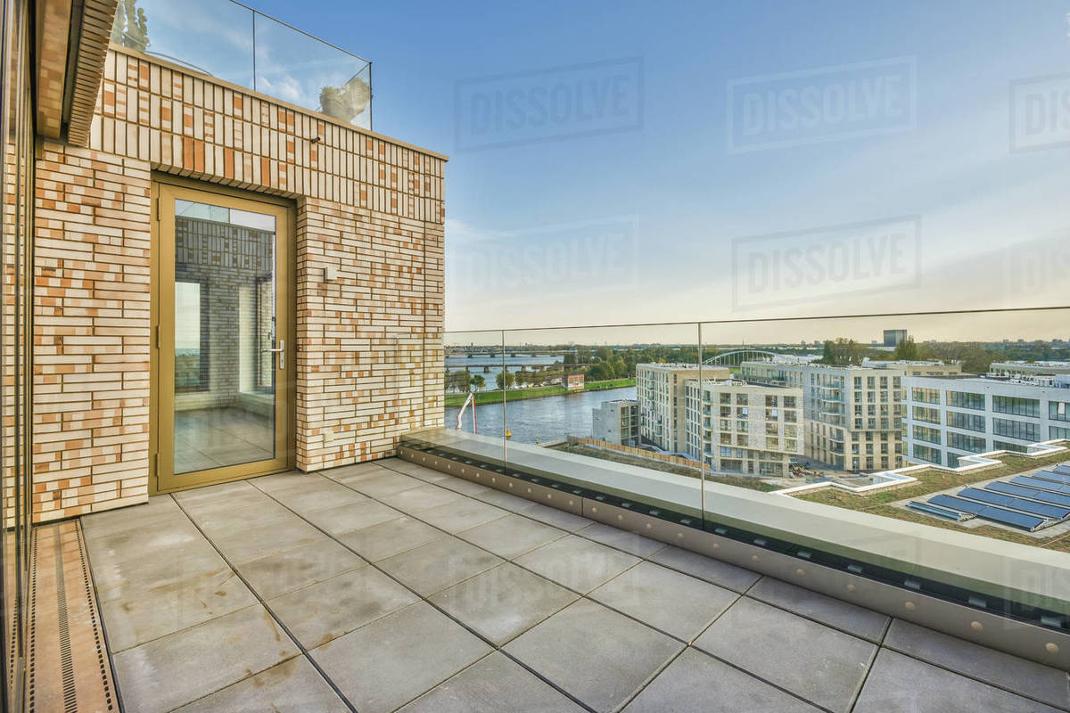 Balcony of a beautiful house in the daytime - Stock Photo - Dissolve