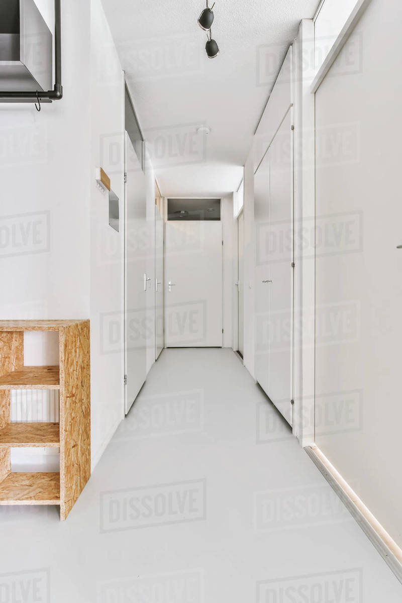 A long empty corridor designed in minimalistic style - Royalty-free ...