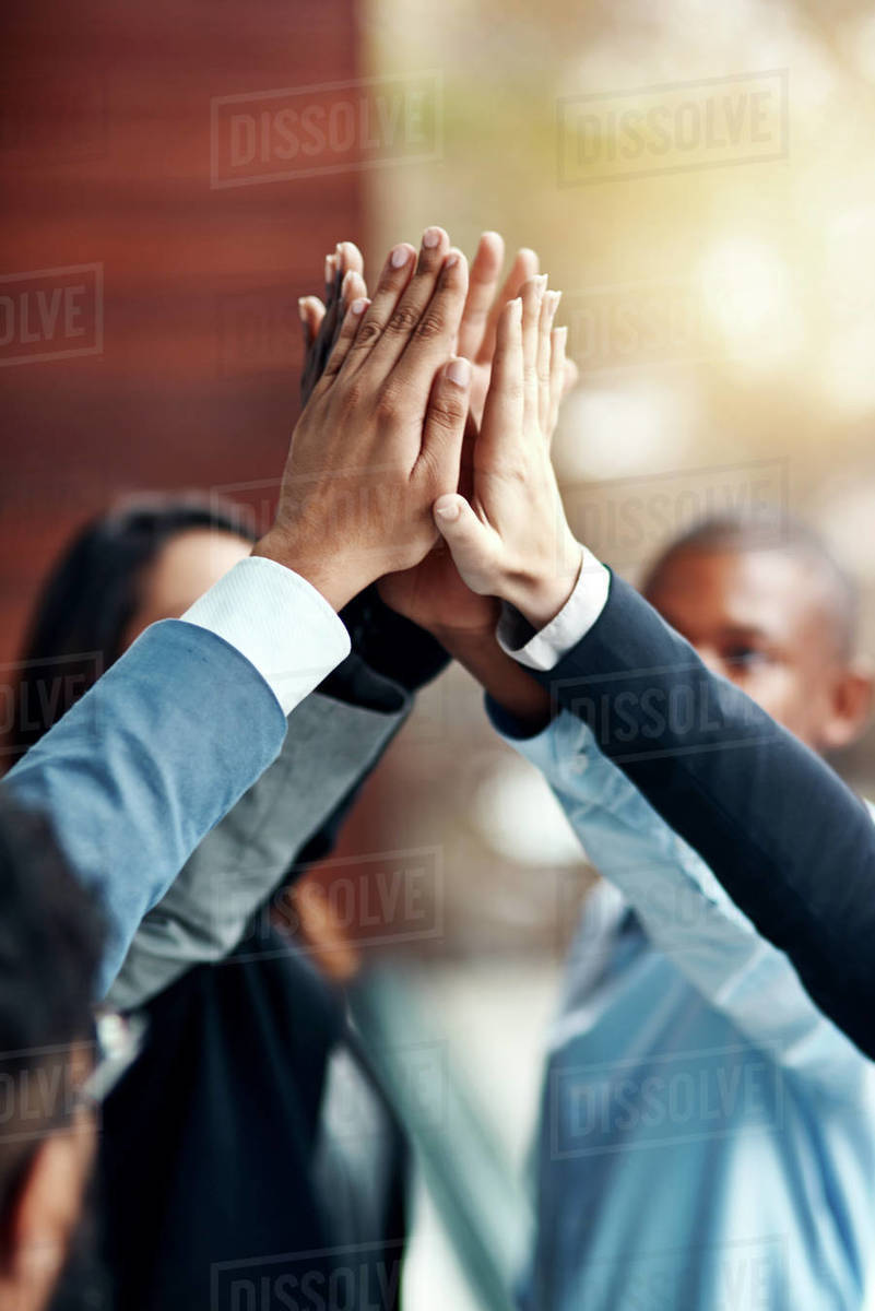 Business people, hands and high five for teamwork, collaboration and team building. Group ...