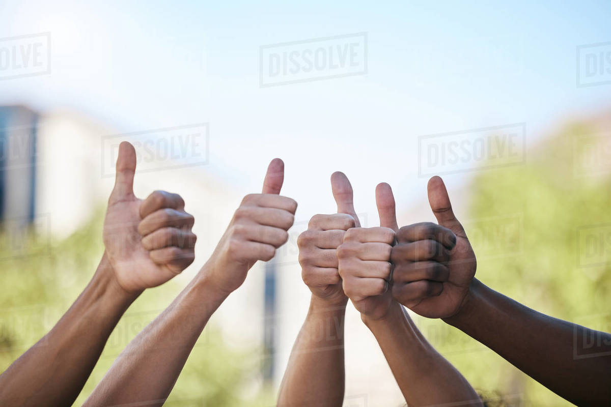 Diversity, hands and thumbs up in collaboration, teamwork or agreement in solidarity together in ...