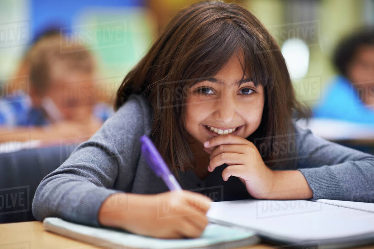 Girl, education and portrait in classroom for learning, information and ...