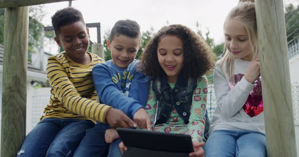 Kids, playground and friends together with tablet, laughing and funny ...