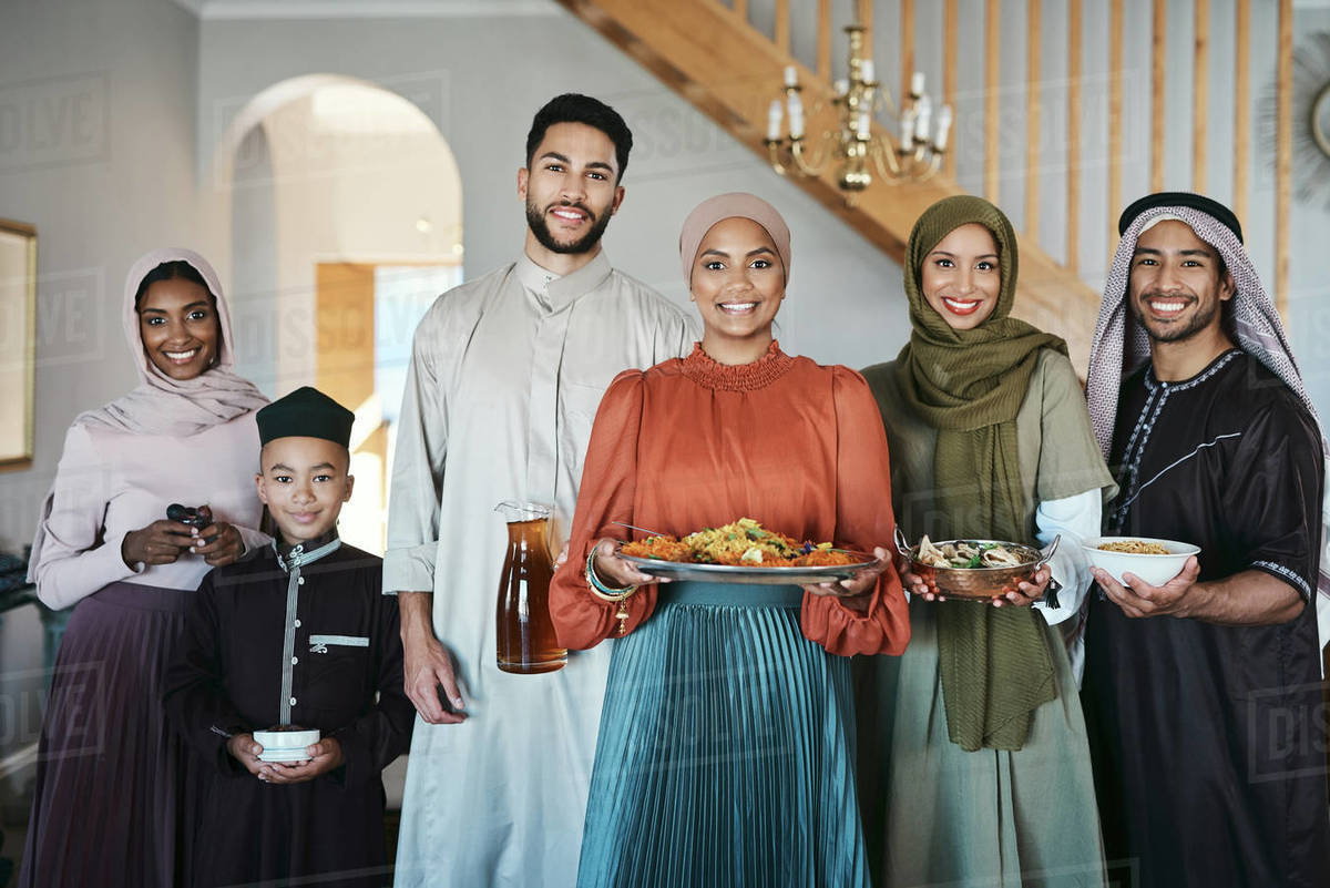 Portrait of a happy, smiling and positive muslim family celebrating ...
