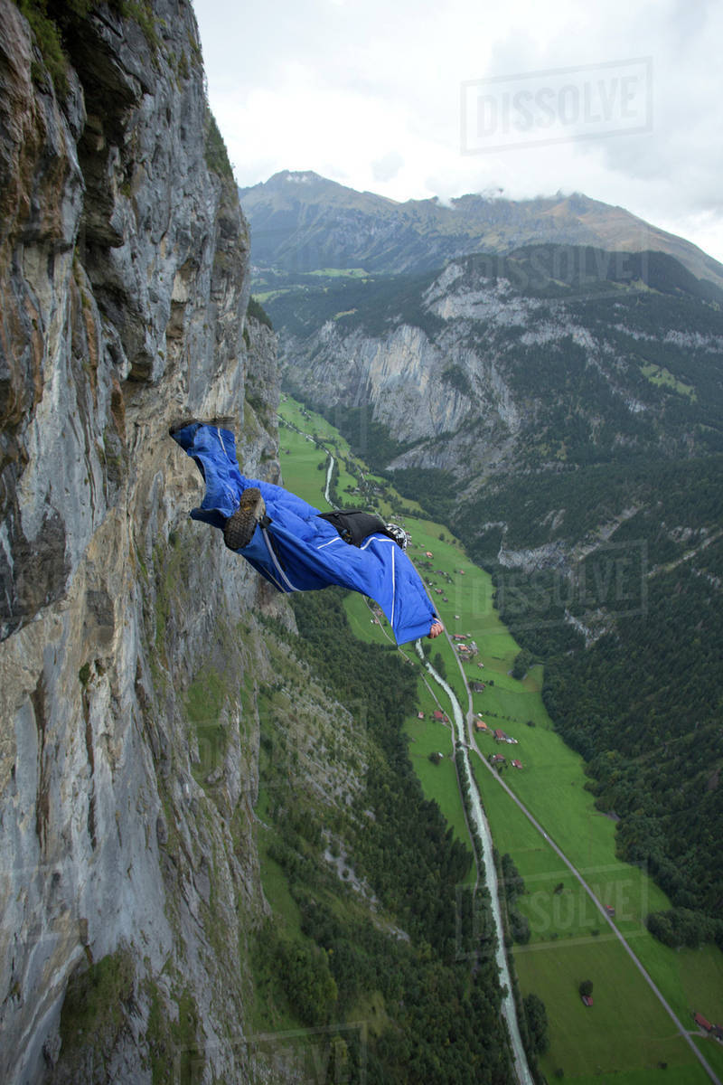 Wingsuit flyer gliding in the air - Royalty-free Stock Photo | Dissolve