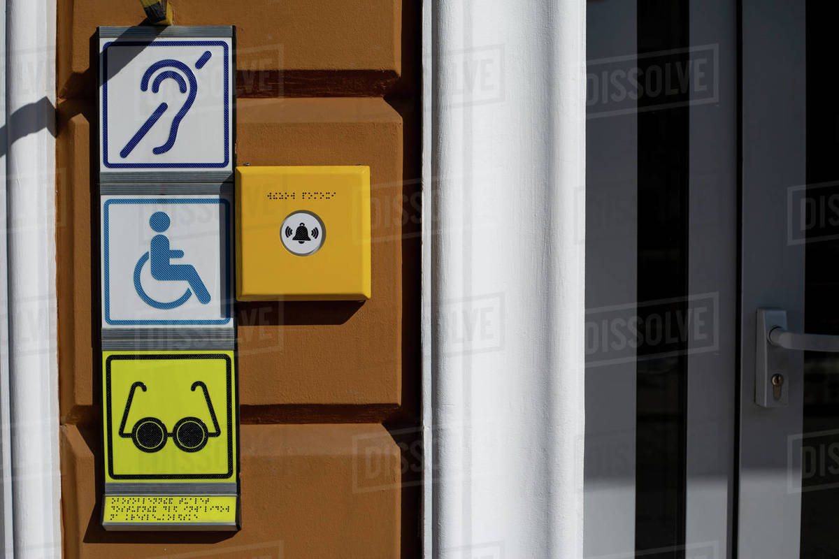 Set of signs characterizing people with disabilities next to button for ...