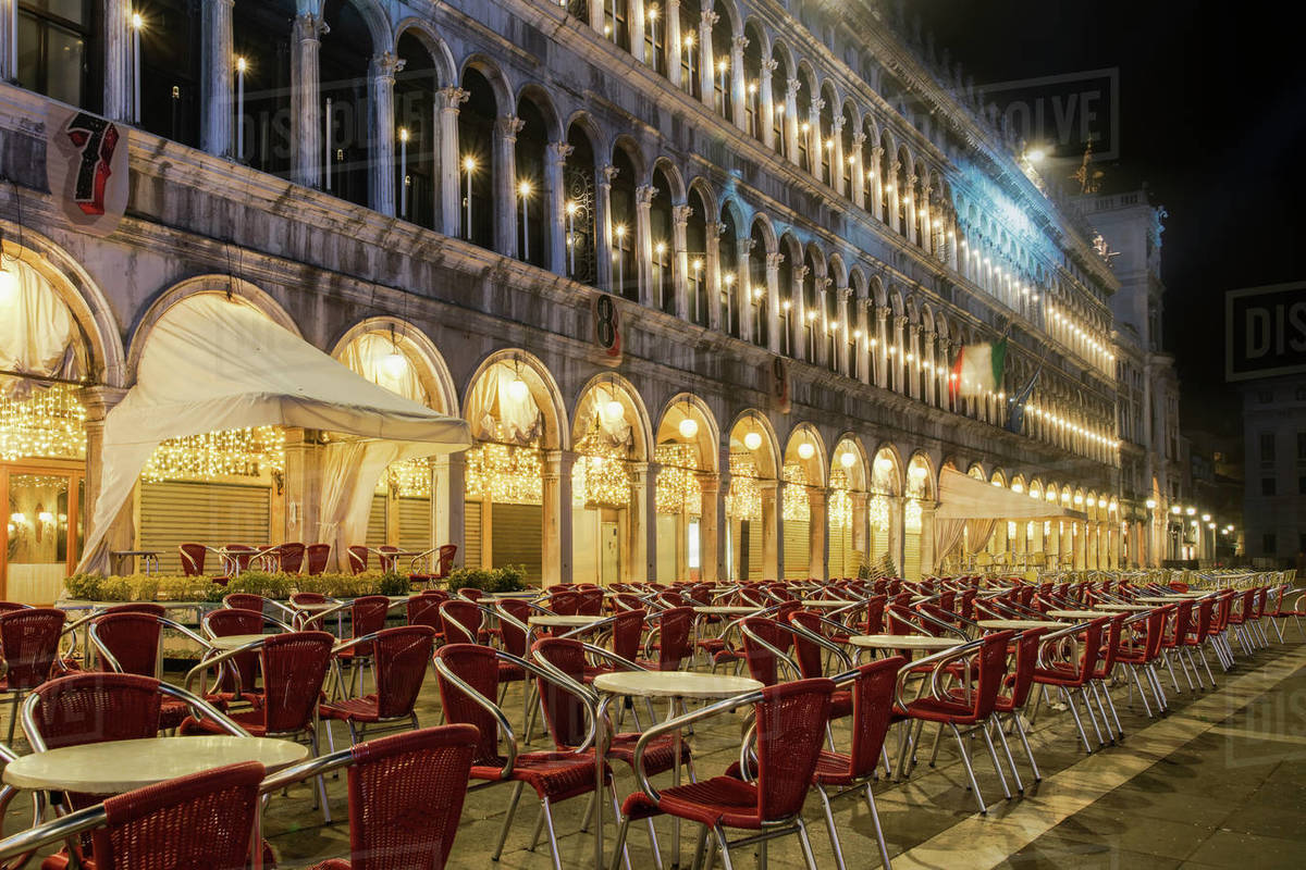 Venice, Italy empty Saint Mark square with arcades at night ...