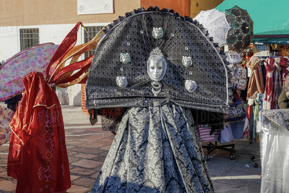 Venice, Italy Carnival mask and costume pose at waterfront.Masked ...