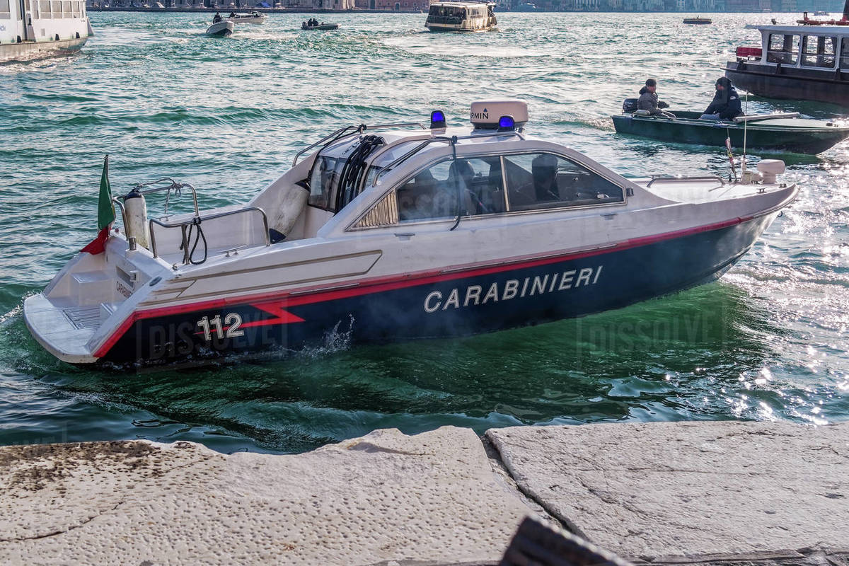 Venice, Italy Carabinieri Police Boat on the lagoon. Evening view of ...