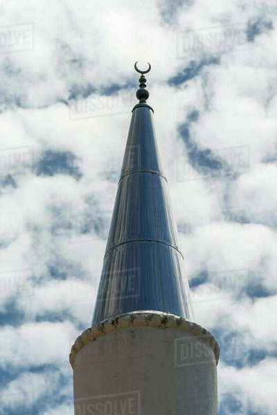Day low angle view of Islamic Culture mosque minaret tower with a ...