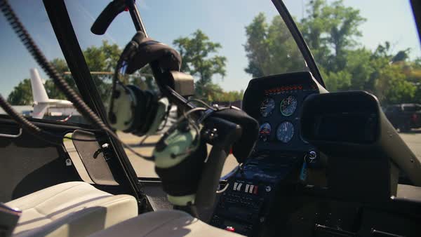Helicopter stands on the pad.View from cockpits of the helicopter ...