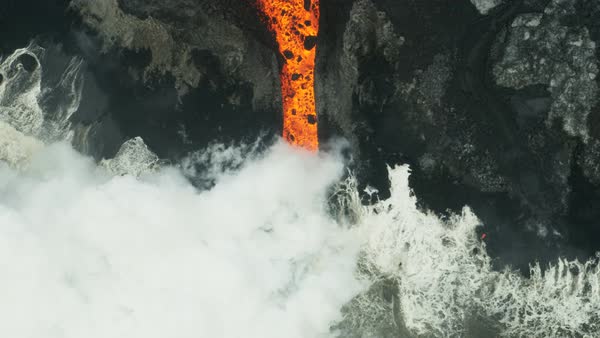 Aerial river of hot liquid magma lava rock cooling solidifying as it ...