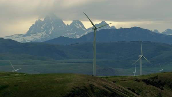 Aerial view of the Grand Teton mountain Range Yellowstone Wind farm ...