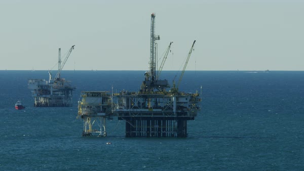 Offshore oil rig drilling platforms in Pacific Ocean - 4K Royalty-free ...