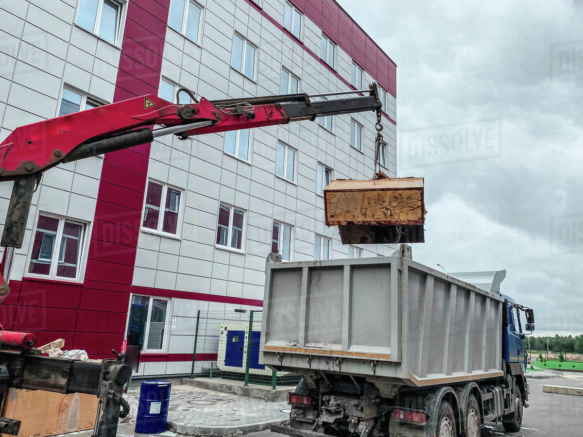load garbage from the tank in a specialized car garbage truck. A ...