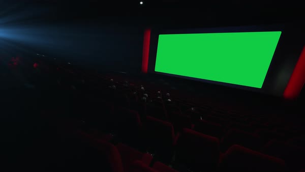 4K - People watching movie in cinema theater. green screen. chroma key ...