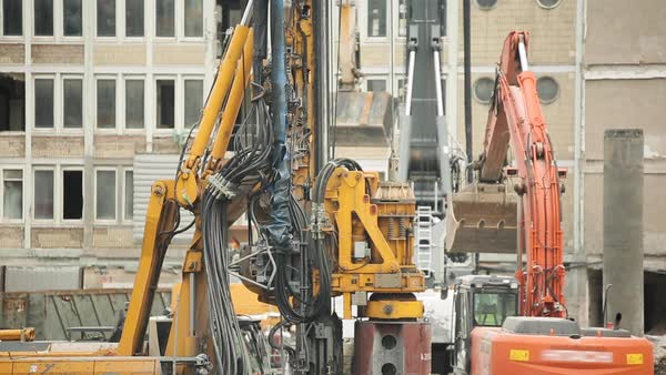 Construction drill machine at work on construction site. - Stock Video ...
