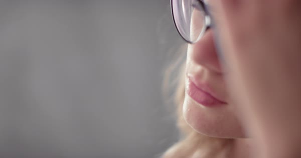 Young woman’s face lost in thought with serious expression - Stock ...
