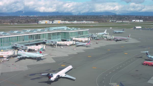 VANCOUVER INTERNATIONAL AIRPORT, CANADA, MARCH 2018: AERIAL: Air Canada ...