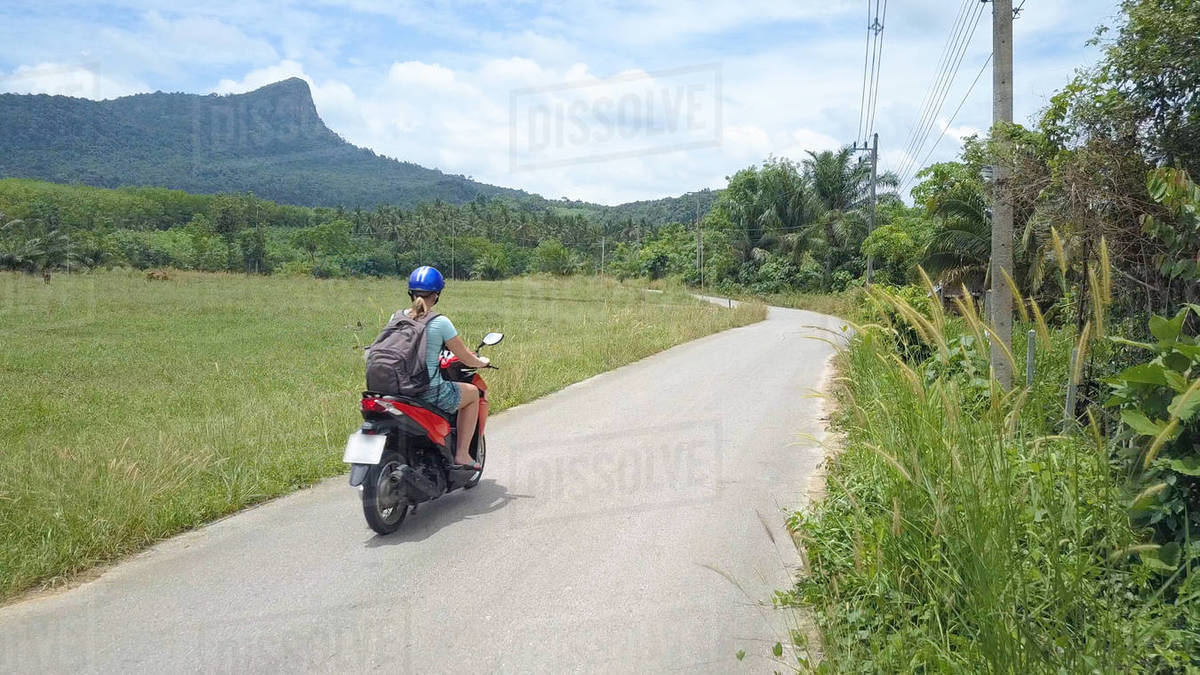AERIAL: Young motorbike enthusiast goes on a scenic road trip through ...