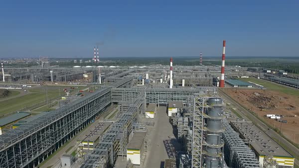Area of oil processing plant, aerial view - Stock Video Footage - Dissolve