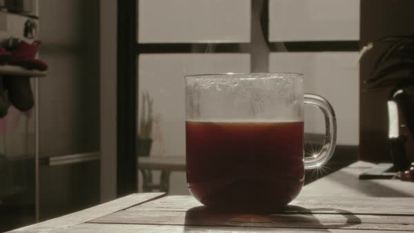 Hot morning coffee to start a day - Stock Video Footage - Dissolve