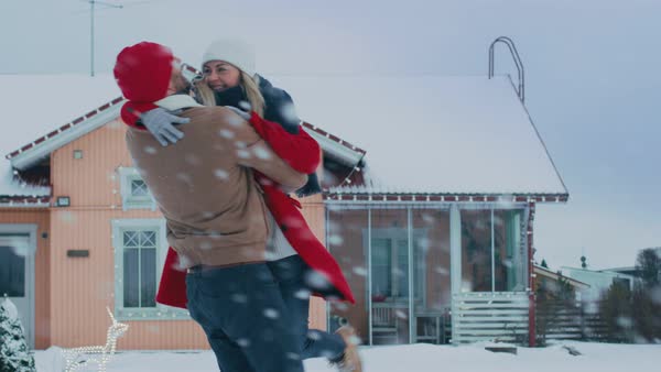 Beautiful young couple dance and spin - hug in the backyard of their ...