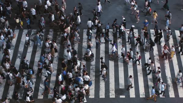 Accelerated high angle top down shot of the people walking on ...