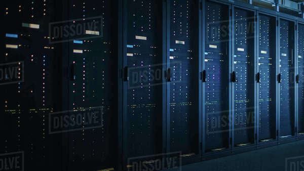 Shot of Dark Data Center With Multiple Rows of Fully Operational Server ...